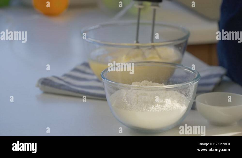 Woman mixing in kitchen Stock Videos & Footage - HD and 4K Video Clips ...