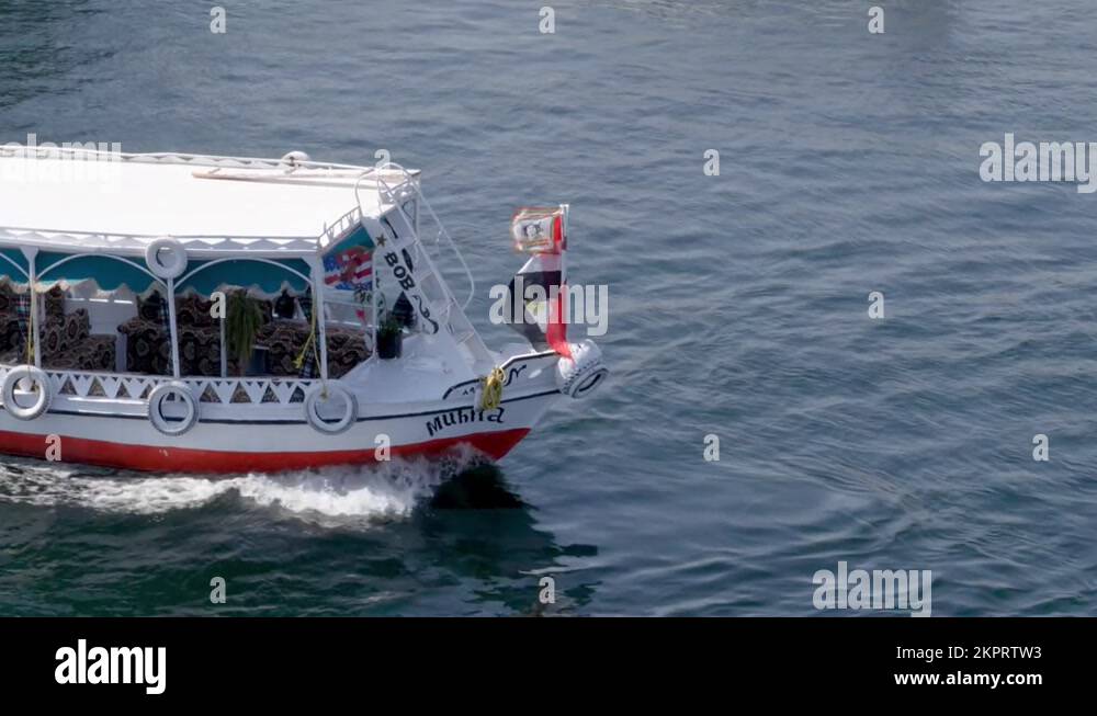Detail of traditional boat front part crusing through the Nile river in ...
