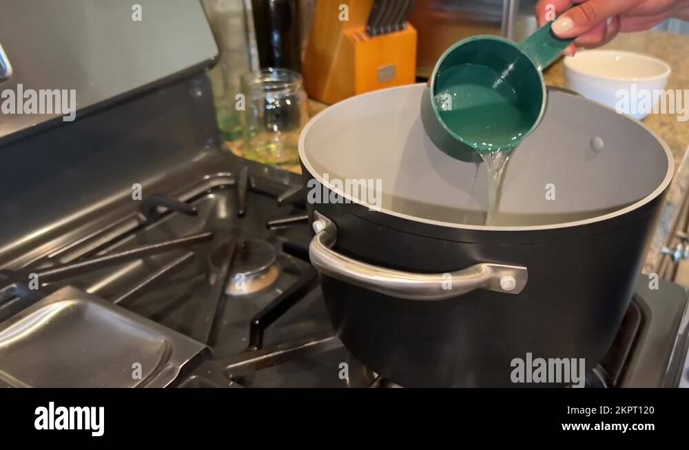 Measuring water to cook Stock Videos & Footage - HD and 4K Video Clips ...