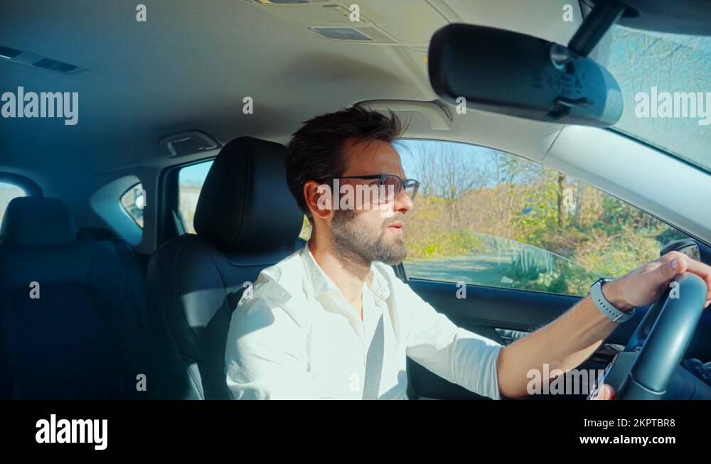 Driver Turning Steering Wheel In Car. Man Driving Auto. Car Driver ...