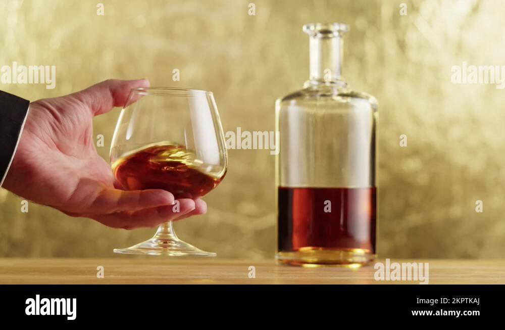 Brandy or whiskey close-up. Luxury cognac. Alcohol amber drink ...