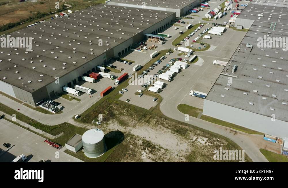 Trucks with semi trailers stand ramps warehouses for loading and ...