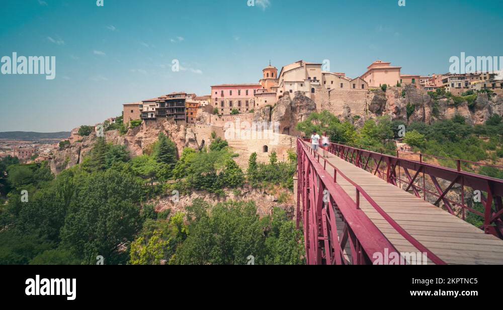 Cuenca iconic landmark people crossing bridge and casas colgadas houses ...