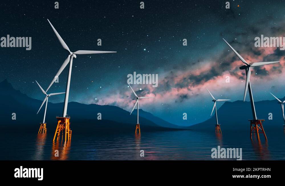 Offshore wind turbines spin around in the starry night marine ...