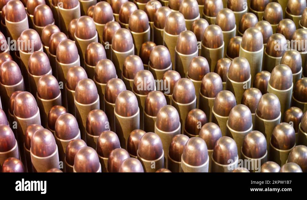 Seamless looping animation of shiny bullets. Munition depot. The ammo ...