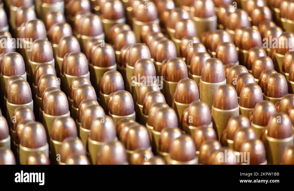 Seamless looping animation of shiny bullets. Munition depot. The ammo ...