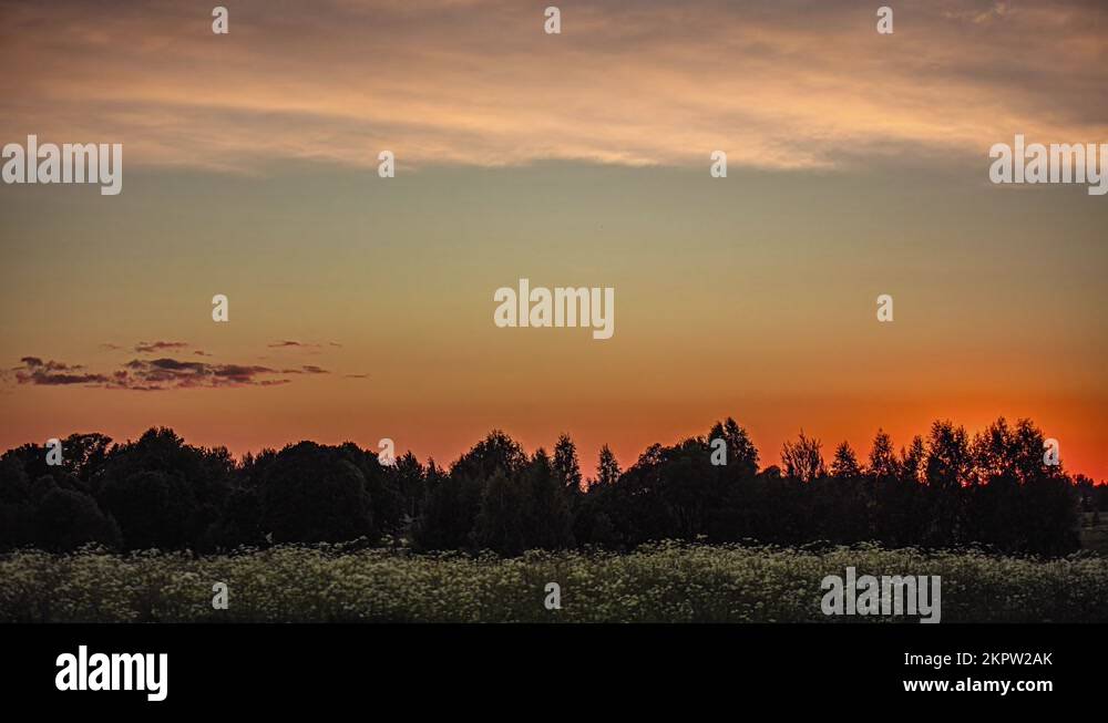 Rural sunset cloudscape sky with aesthetic nostalgic meadow and forest ...