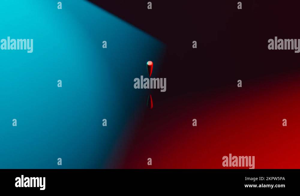 Slow-motion shot of a shiny bullet shattering a piece of clear glass ...