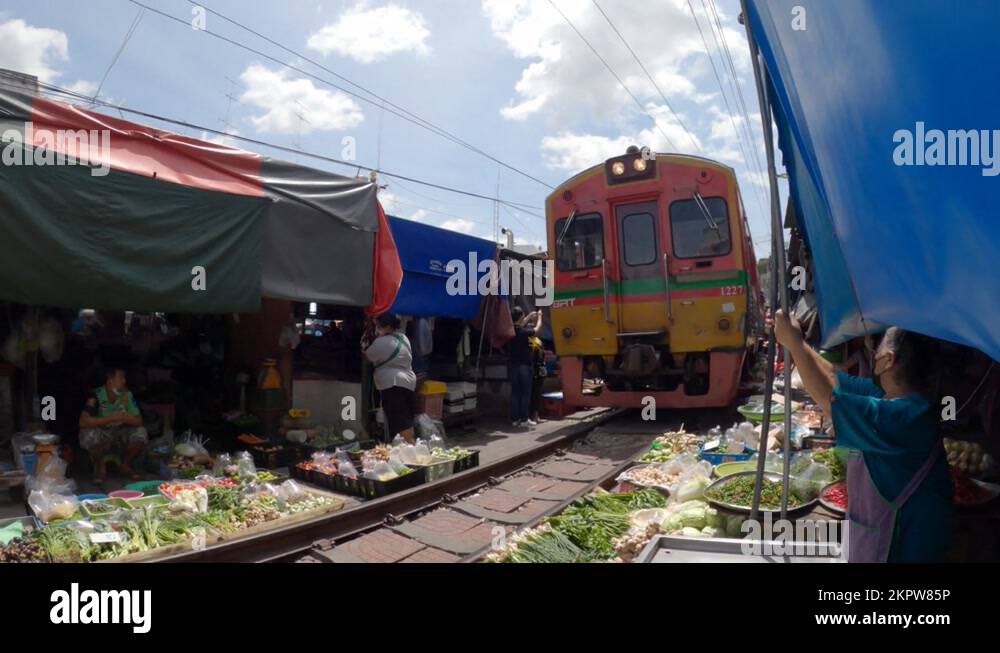 Train track pass through fresh market Stock Video Footage - Alamy