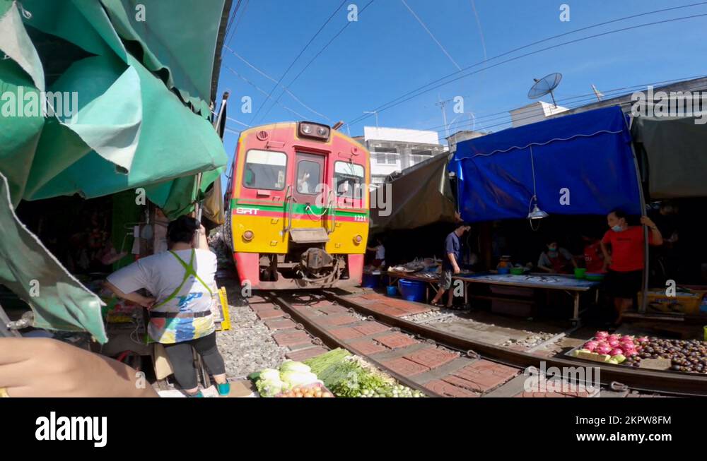 Train track pass through fresh market Stock Video Footage - Alamy