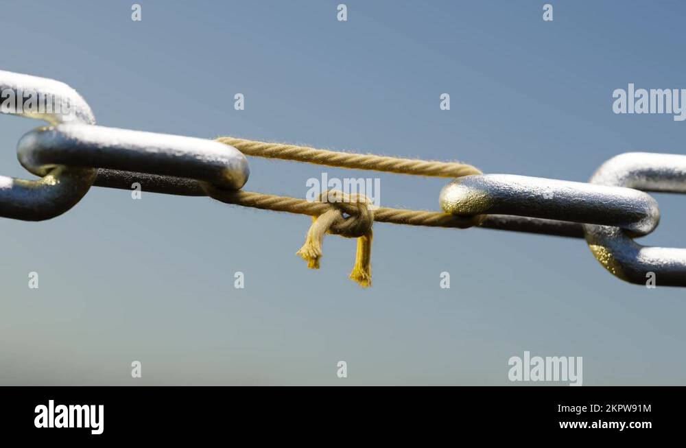 One chain link was misplaced by a rope knot. Symbol of weakness and ...
