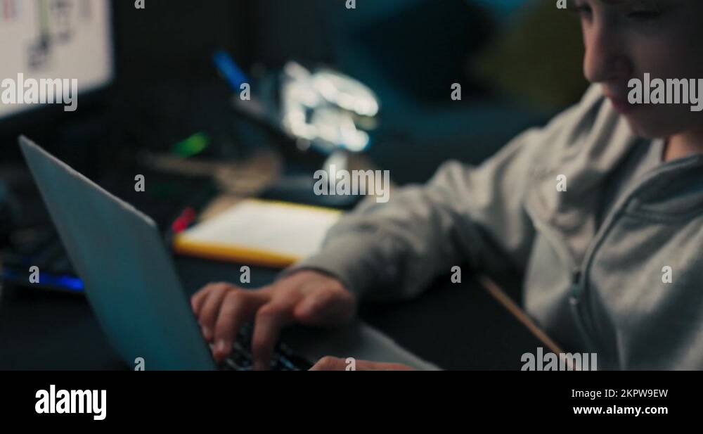 A child designs a building for tech class, does homework, draws with a ...