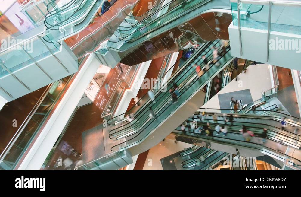 People in escalators at the modern shopping mall. Time lapse Stock Video Footage - Alamy