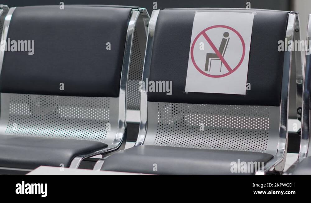 Empty hospital reception chairs with covid 19 safety prevention Stock ...
