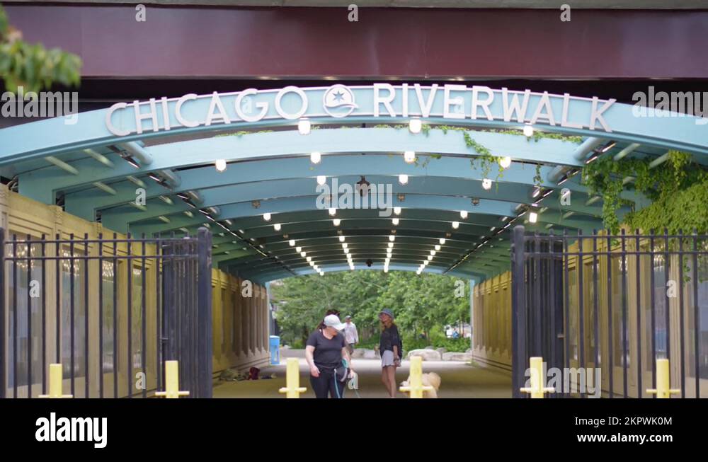 Chicago Riverwalk Sign, Entrance Gate, Tunnel and People Walking on ...