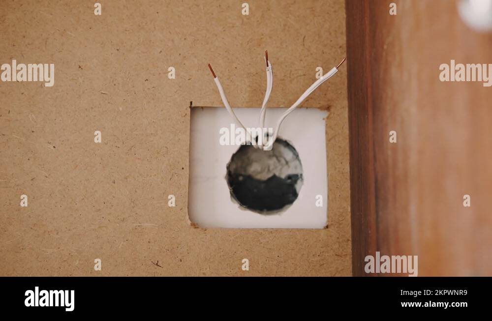 Installation of a kitchen hood, renovation in a new house, a hole with ...