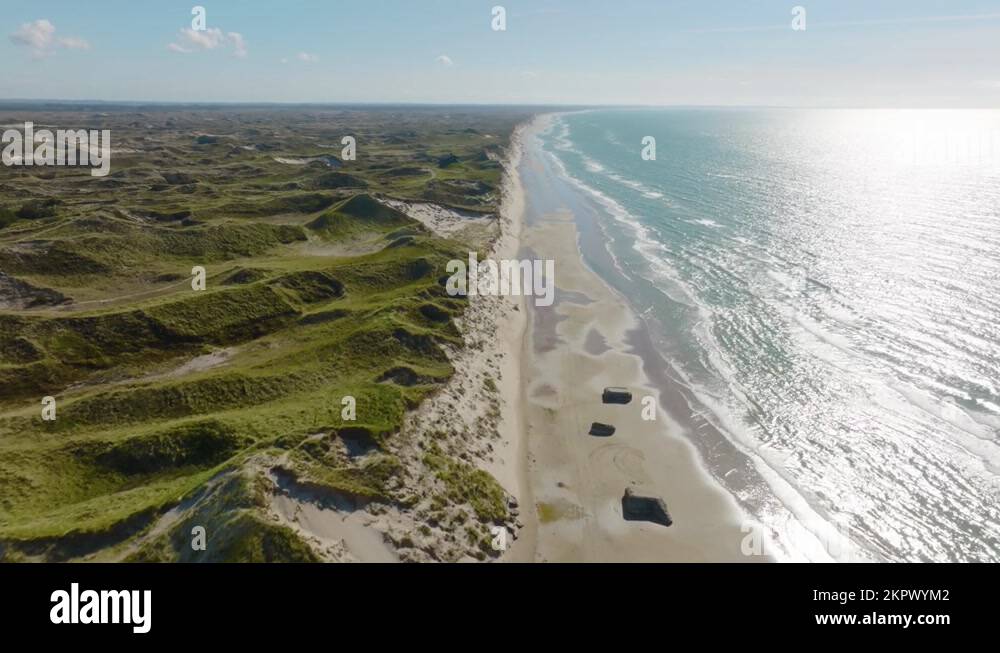Panoramic view, sand dunes, the World War II bunkers on a beach, and ...