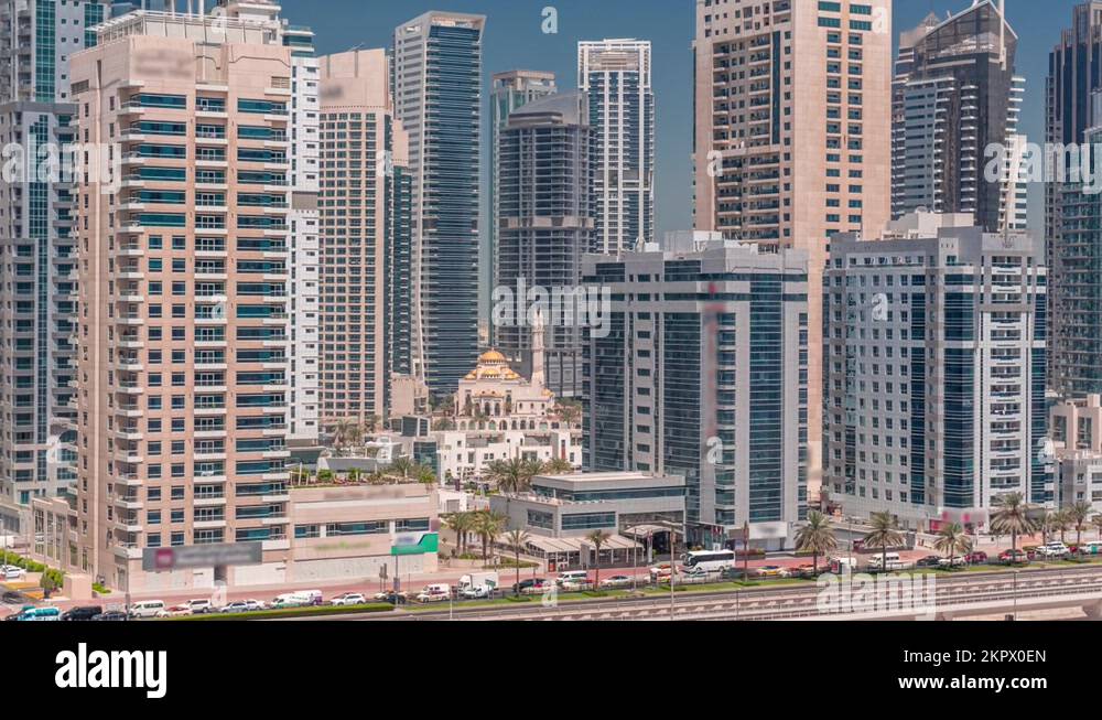 Dubai Marina skyline with Mohammad Bin Ahmed Al Mulla mosque aerial ...