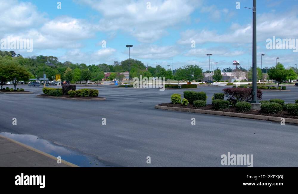 Empty parking lot in a retail sector right at the beginning of the 2020 ...