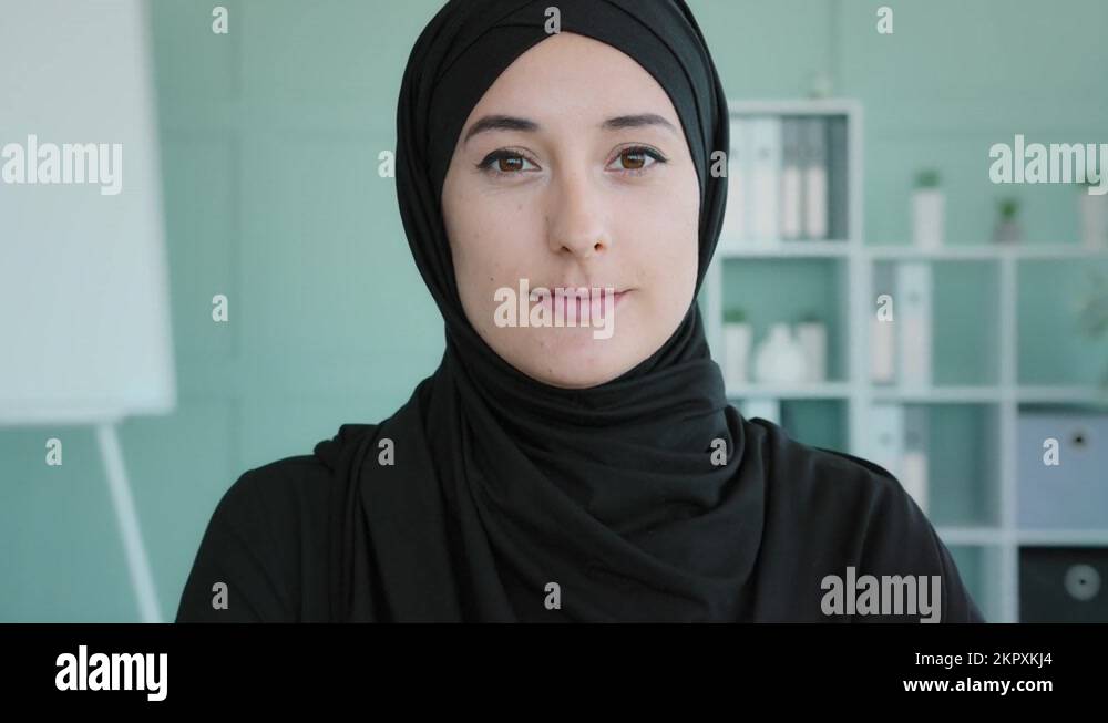 Female portrait happy Arabian 20s girl in black hijab Islamic Muslim ...