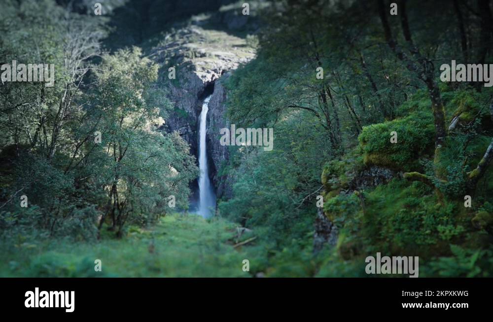 A view of the waterfall falling into a deep gorge. Tilt-shift video ...