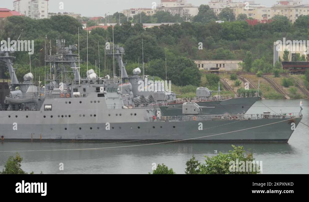 Warship destroyer frigate with armament in military harbor ready for ...