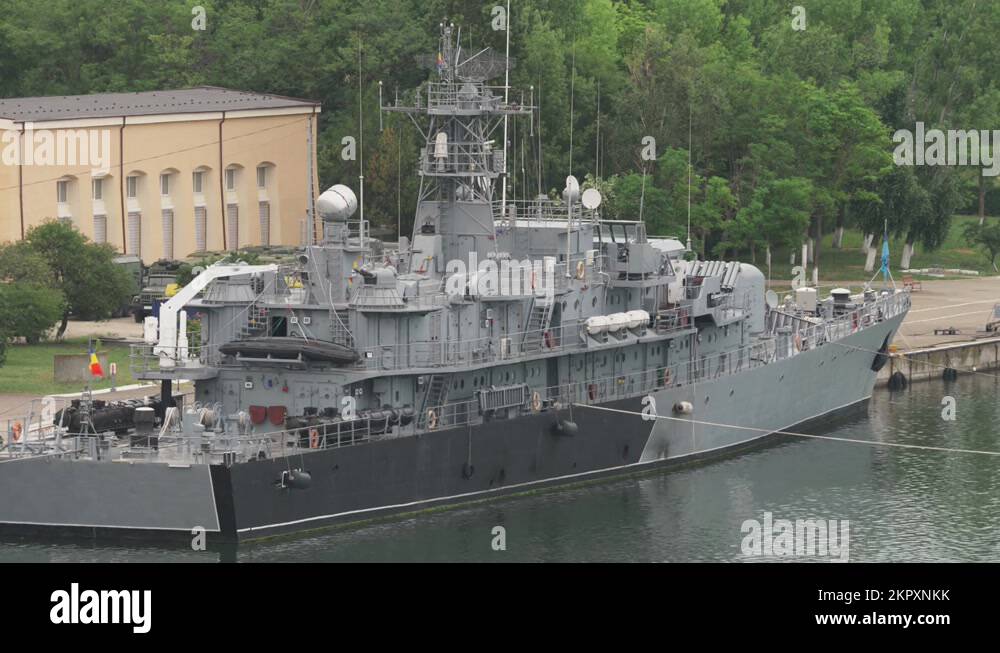 Warship destroyer frigate equipped with armament docked in military ...