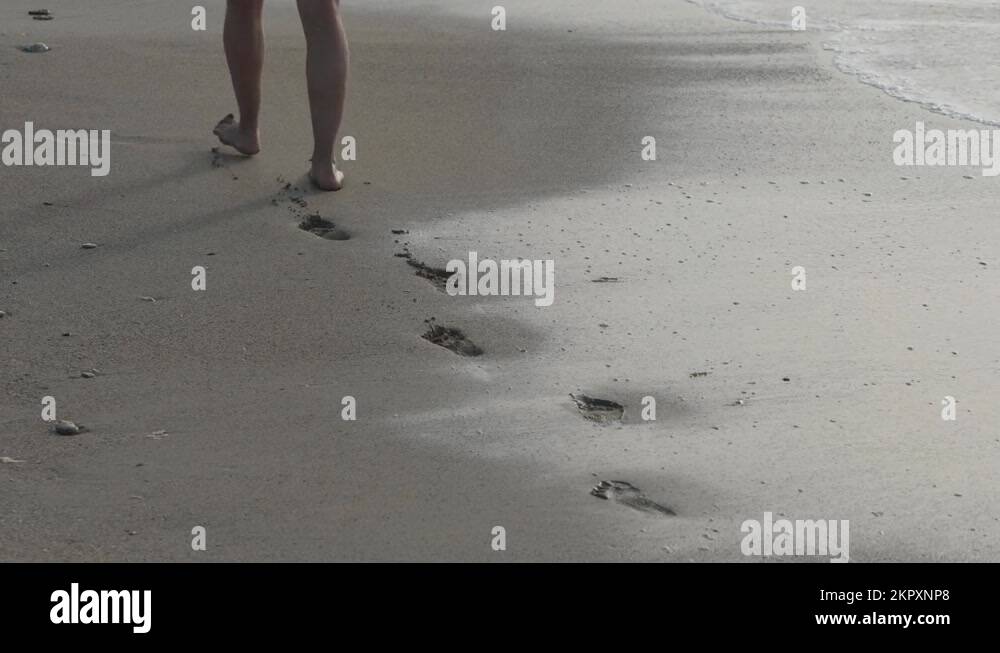 Beach walking footprints Stock Videos & Footage - HD and 4K Video Clips ...