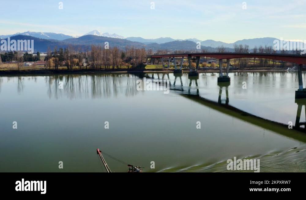Crane Vessel Sailing At Fraser River Passing Under The Mission Bridge ...