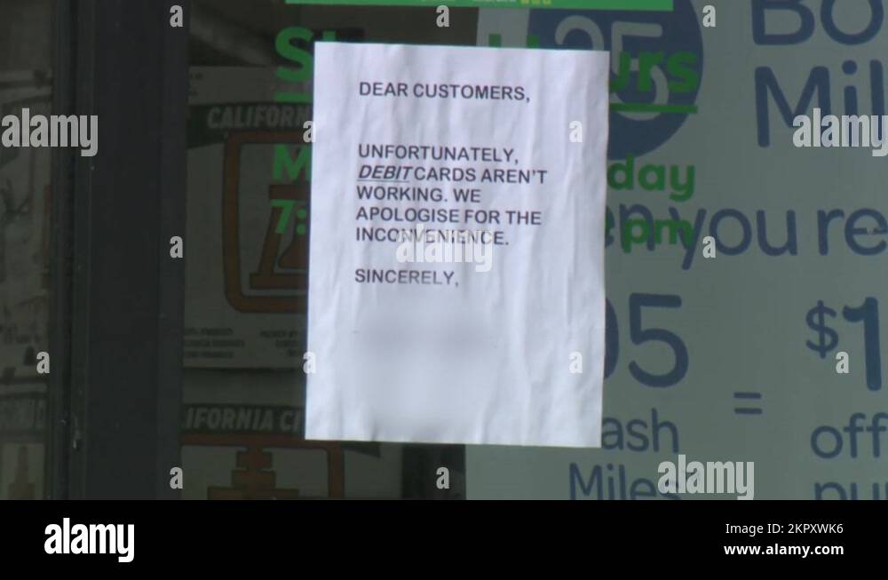Internet outage & debit payments down. Signs posted on grocery store ...