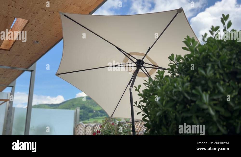 Terrace parasol Stock Videos & Footage - HD and 4K Video Clips - Alamy