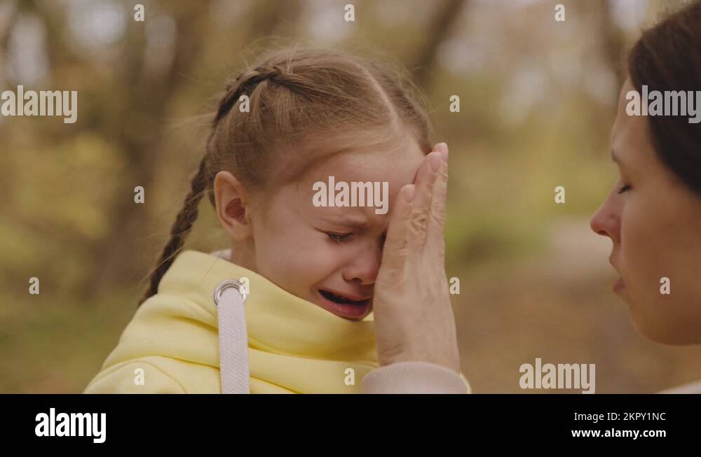child crying. close-up face. tears eyes little kid girl. unhappy upset ...