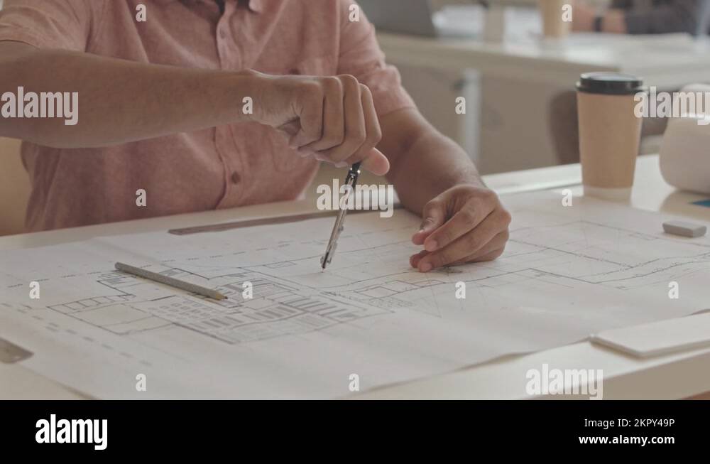 Architect with Compass Drawing Building Plan Stock Video Footage - Alamy