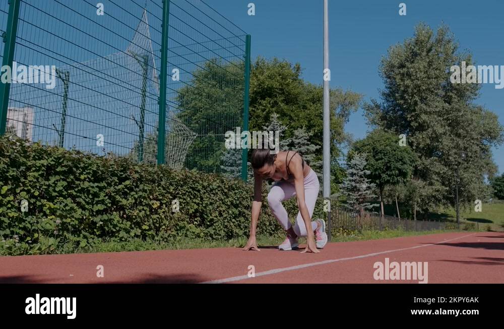 Runner crouching starting block Stock Videos & Footage - HD and 4K ...