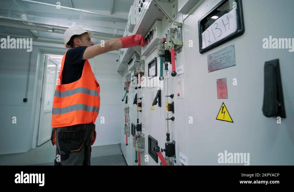 Electrical engineer working check the electric current voltage and ...