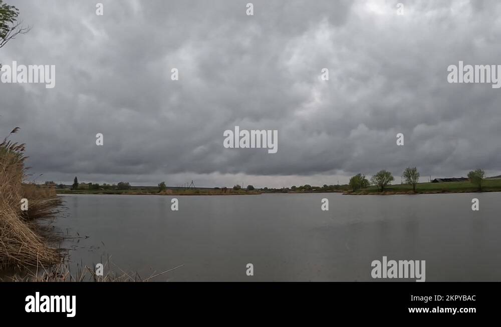 Dark rain cloud over village Stock Videos & Footage - HD and 4K Video ...