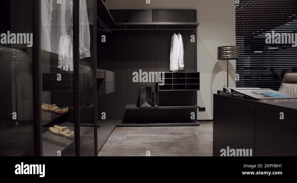 Black wardrobe with Sliding Black Doors. , Luxury Bedroom With Walk In ...