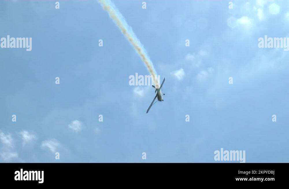 Airplane disaster in the air. Airplane with smoke in blue sky. Crashing ...