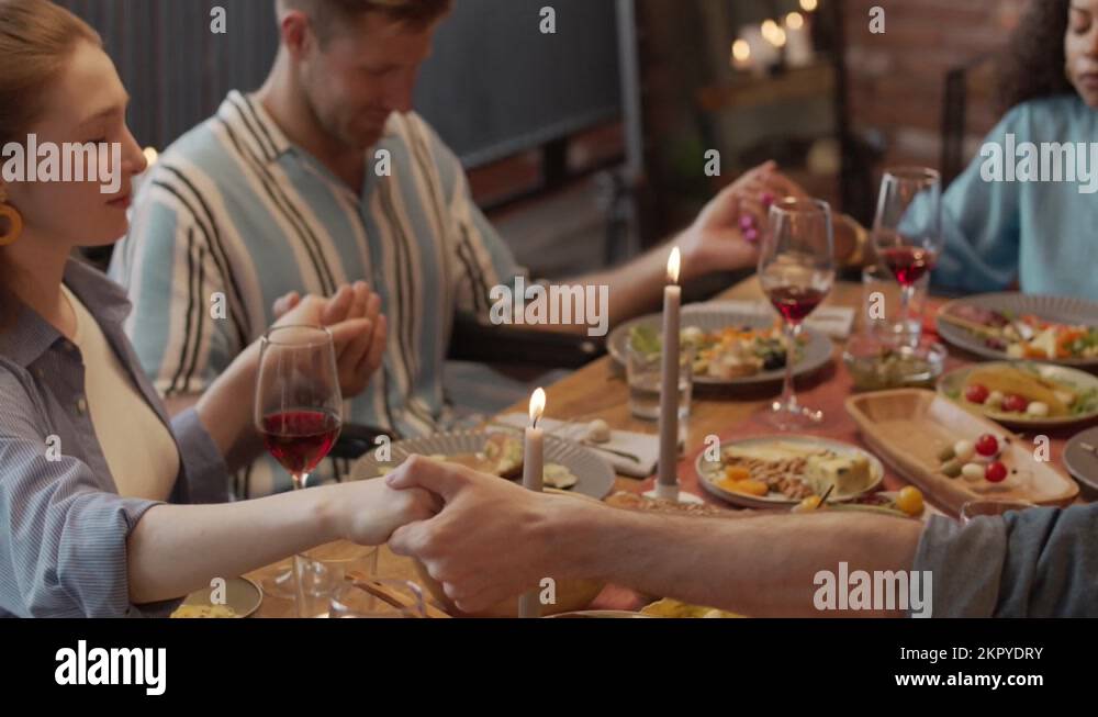 Friends praying Stock Videos & Footage - HD and 4K Video Clips - Alamy