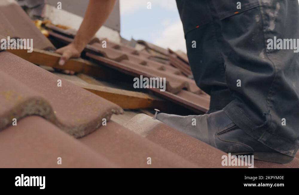 Repairing roofing tiles Stock Videos & Footage - HD and 4K Video Clips ...