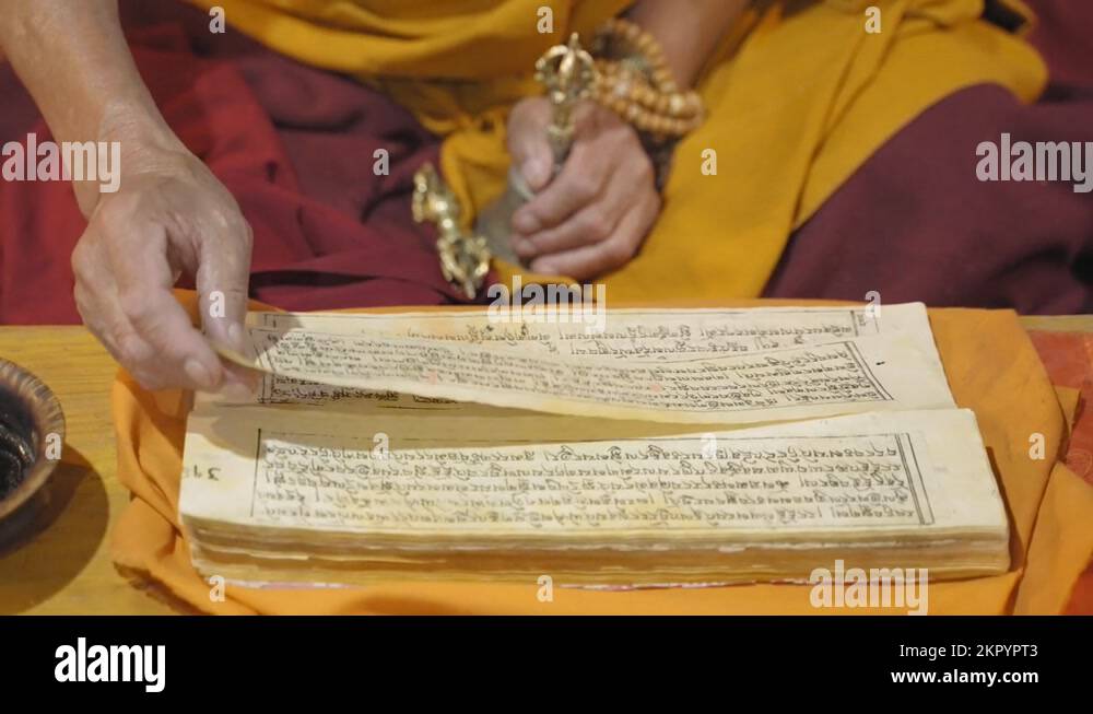 Monk Reading Buddhist Sacred Scriptures On Tripitaka At Thiksey ...