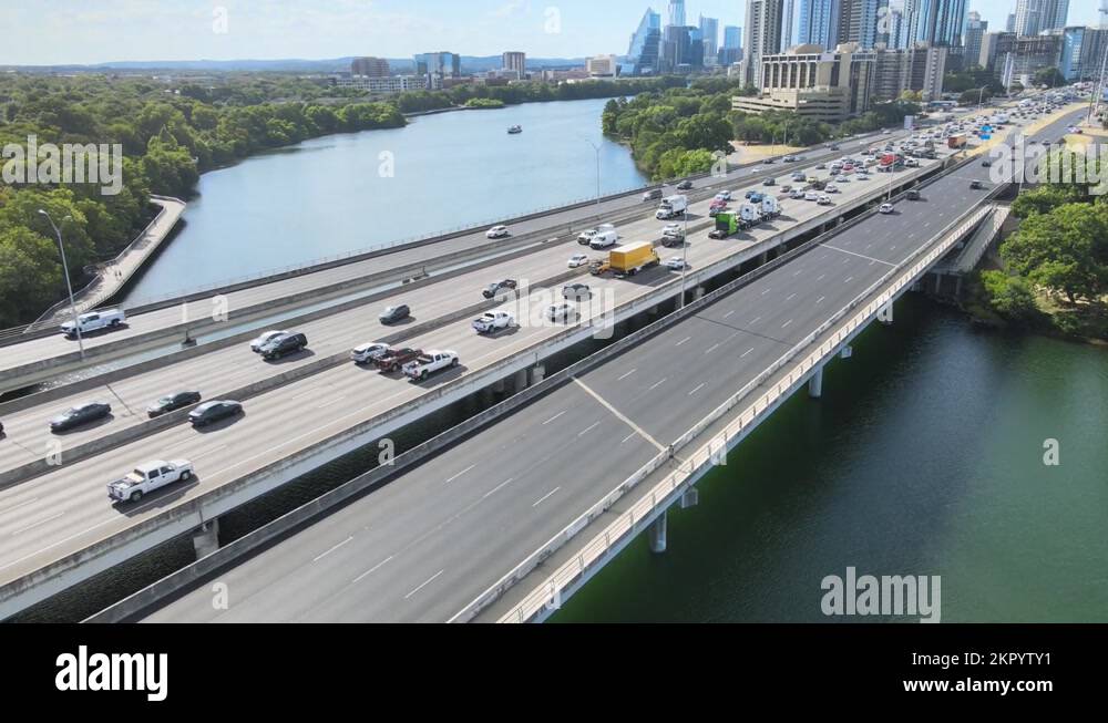 Panning up drone footage of rush hour traffic in Austin, Texas. The ...