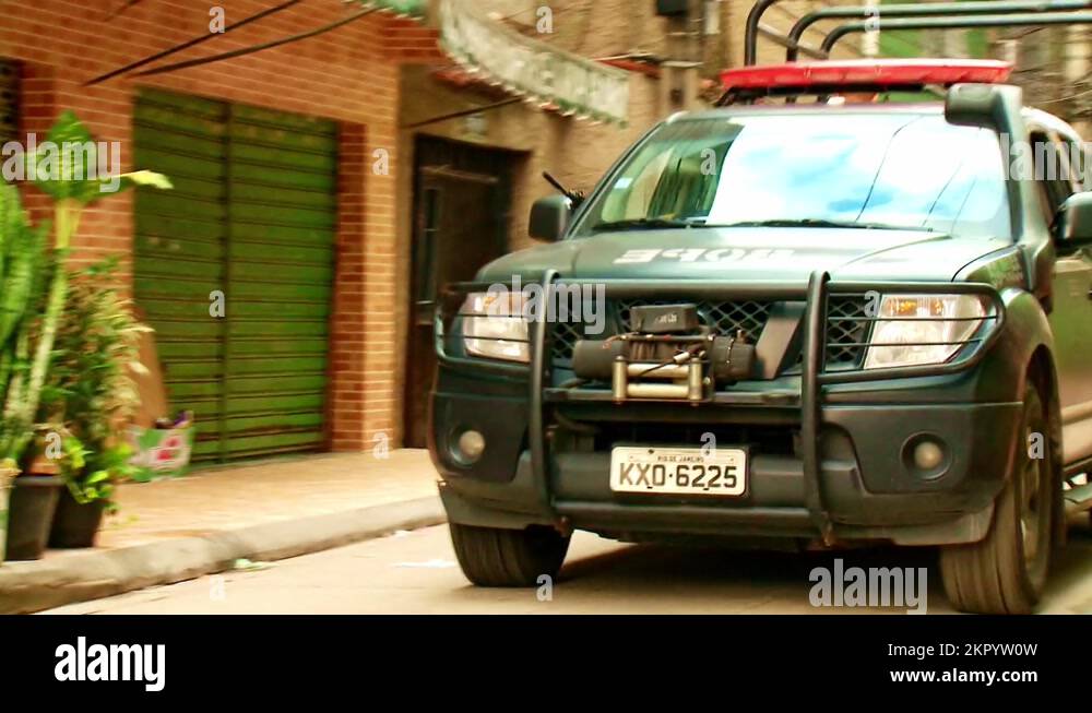 Police vehicle patrolling the favela for drug gangs Stock Video Footage ...