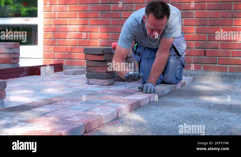 Pavers paving hammer Stock Videos & Footage - HD and 4K Video Clips - Alamy