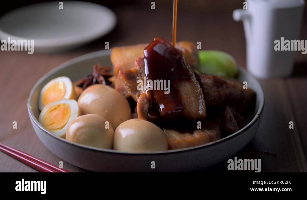 dongpo pork with egg, chinese stewed pork belly Stock Video Footage - Alamy