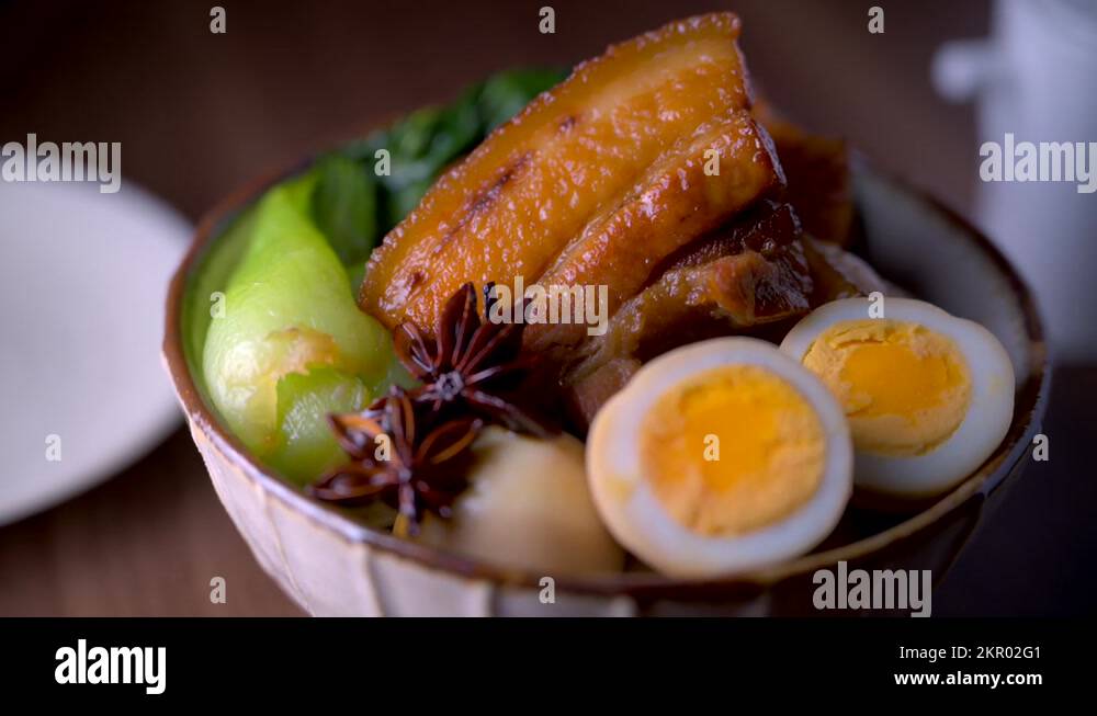 dongpo pork with egg, chinese stewed pork belly Stock Video Footage - Alamy
