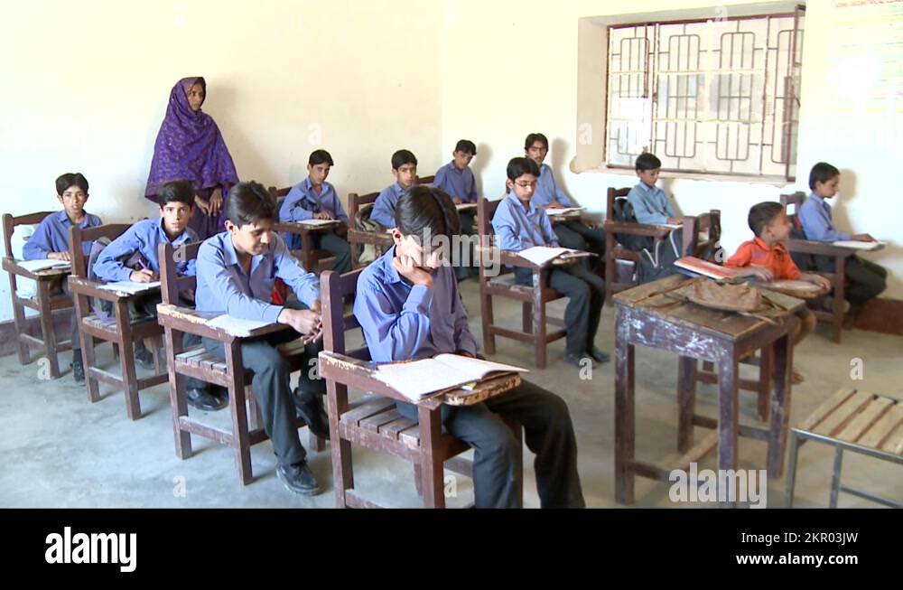 Female teacher teaching in a classroom Stock Video Footage - Alamy