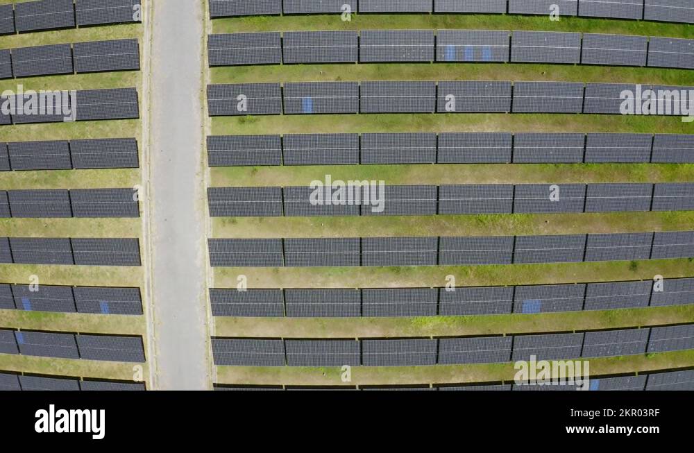 Aerial top view above of solar panels in solar cell field. Bird’s eye ...