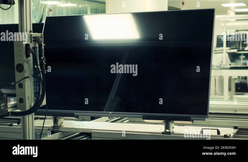 Modern production of TVs, view of the assembly line, TV screen test ...