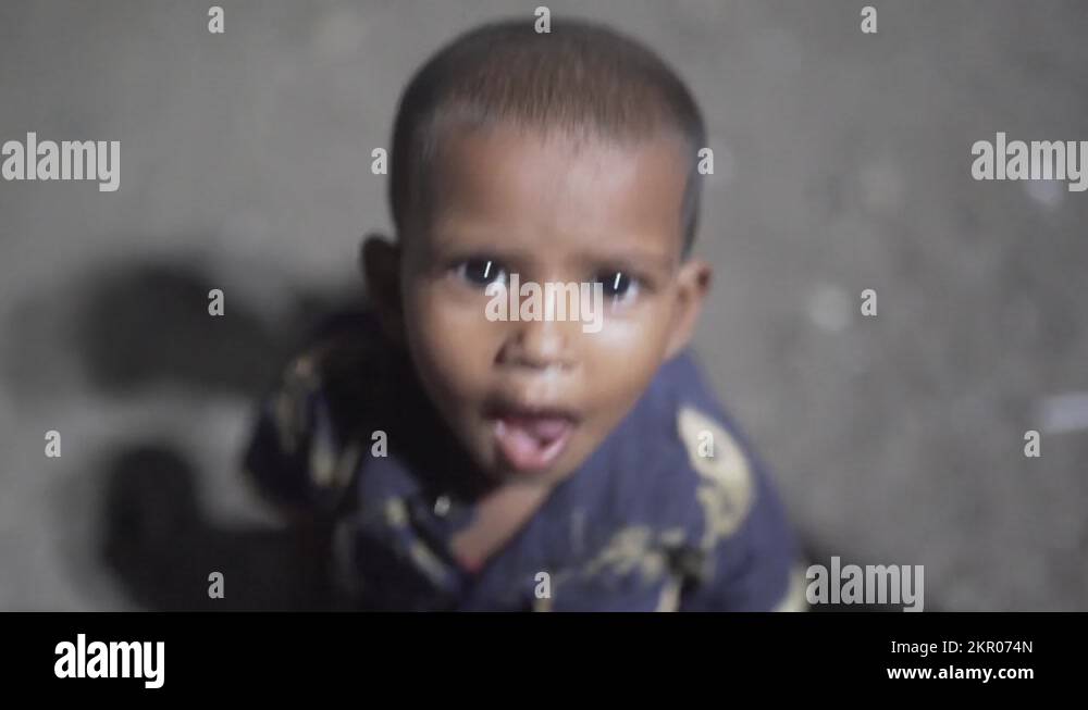 Toddler from Slum Area stare into camera | 4k Stock Video Footage - Alamy